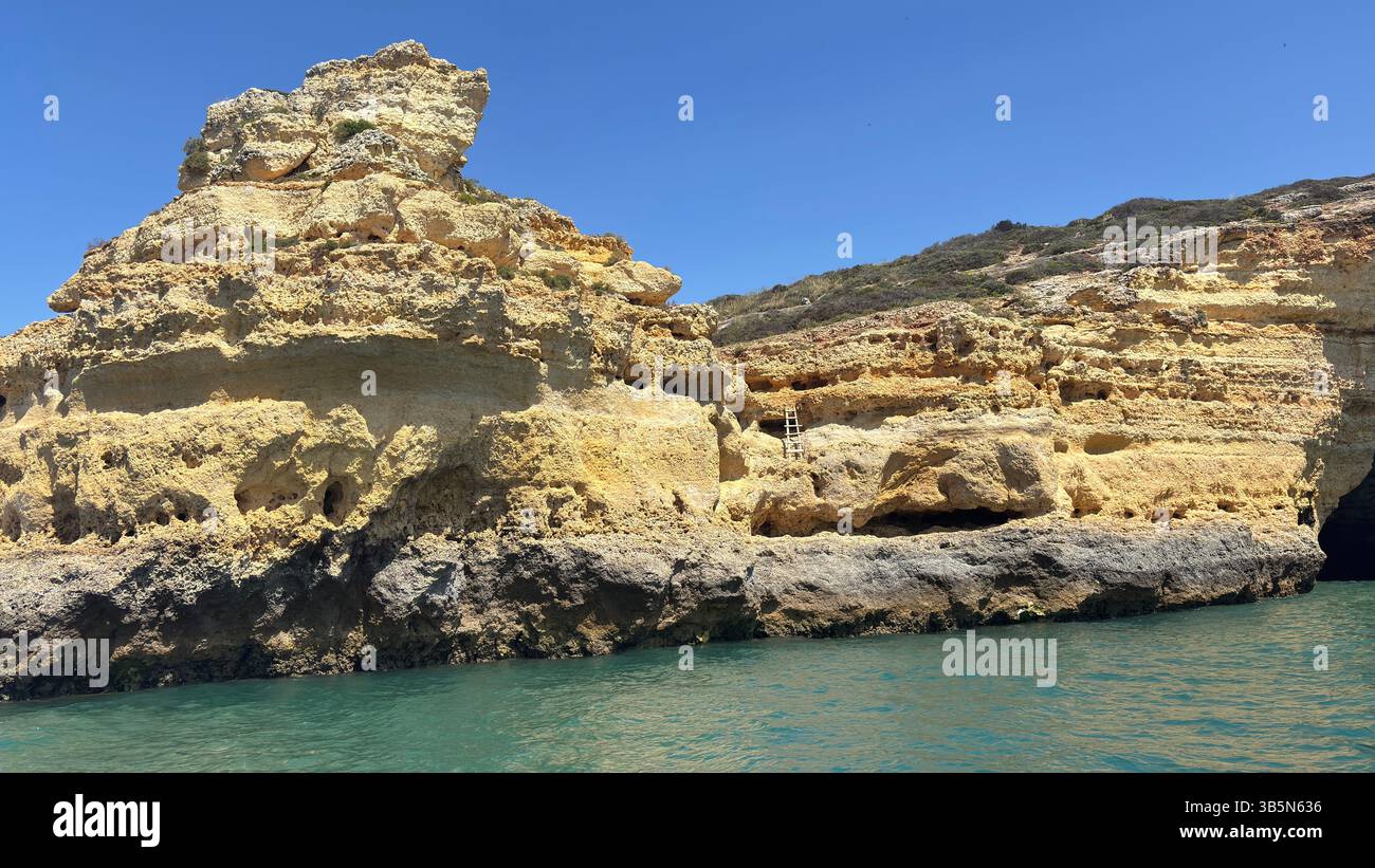 Beautiful coastal cliffs, rocks and beaches on the Algarve coastline of ...
