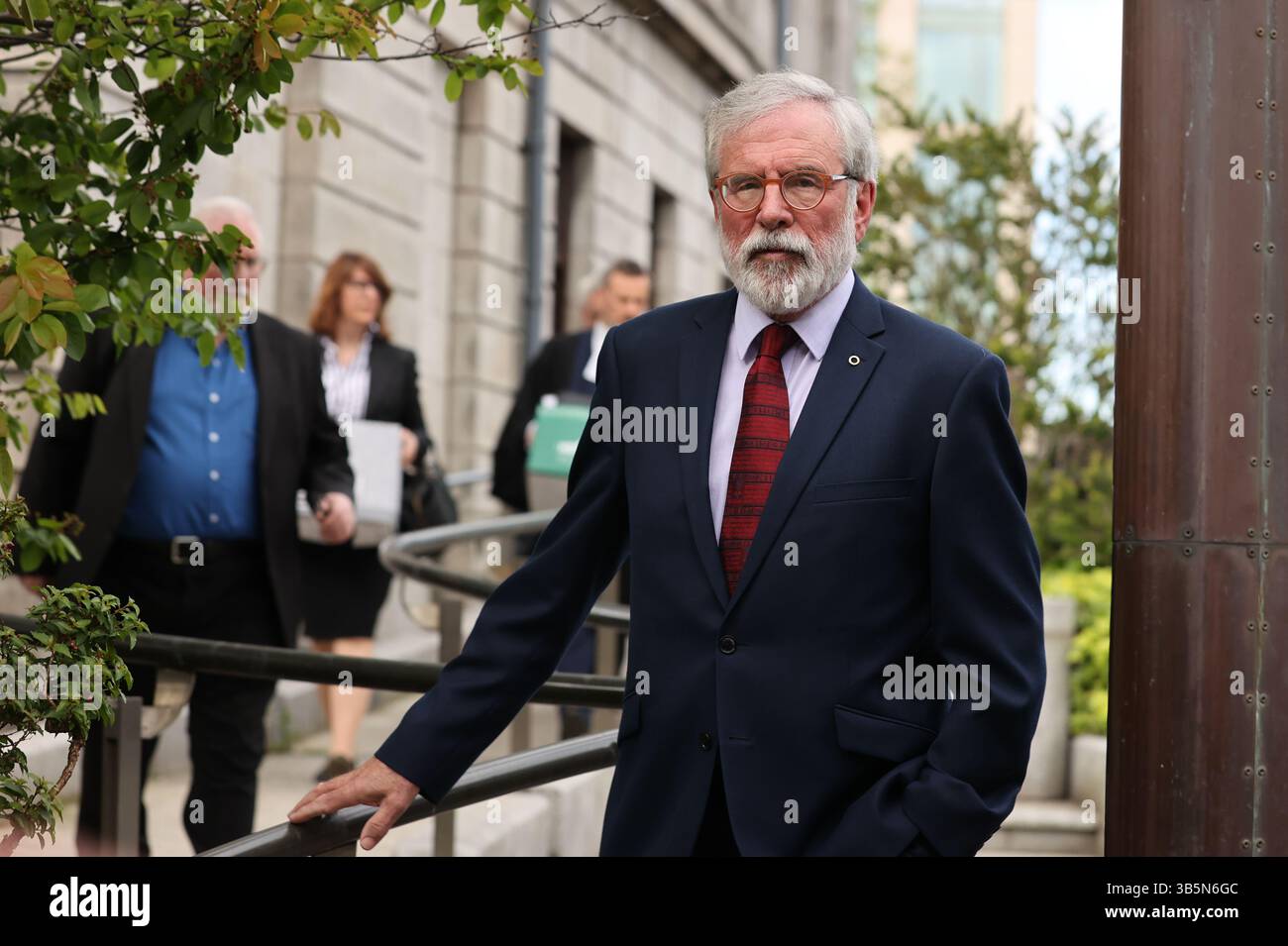 Gerry Adams leaves the High Court in Dublin, where the former Sinn Fein ...