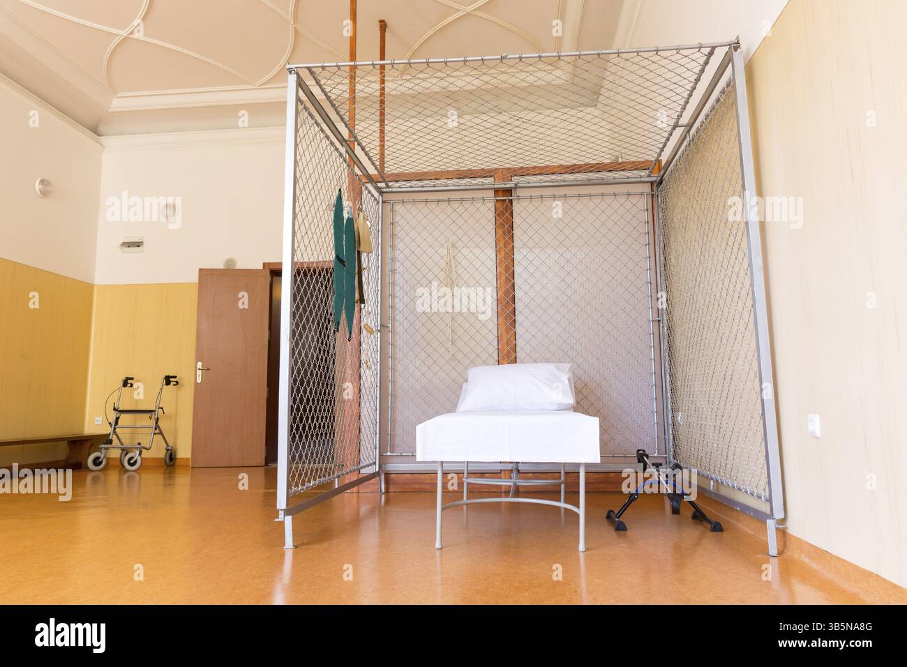 A room in a rehabilitation centre part of a military hospital. A bed in ...