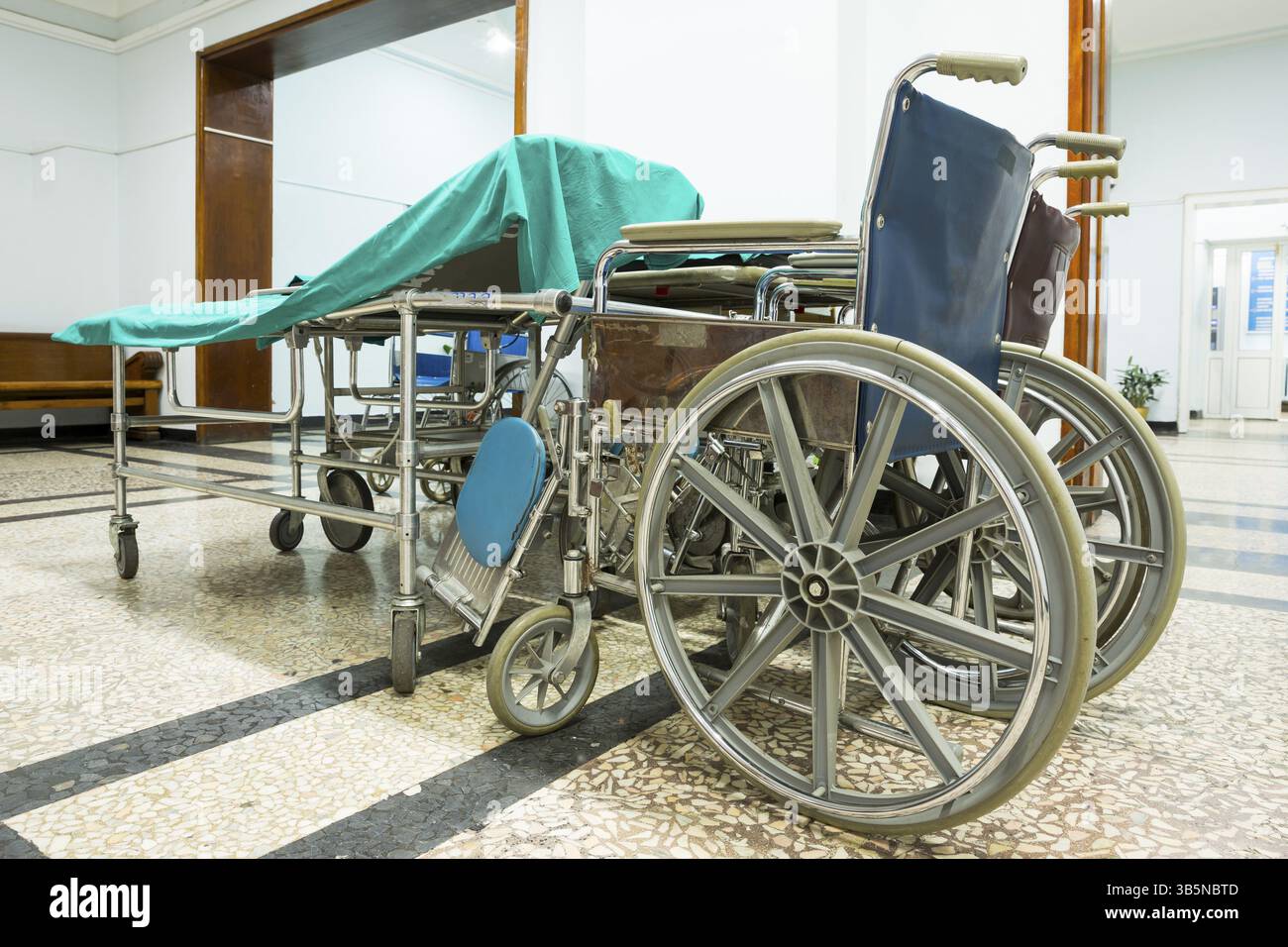 Wheelchair in a hospital corridor for physically disabled patients. No ...