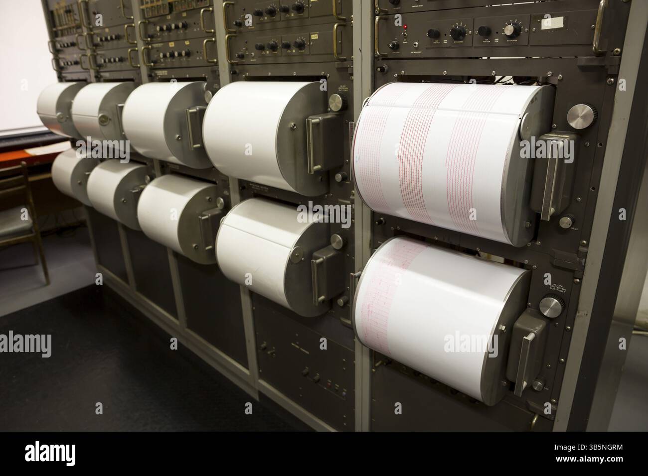 Seismograph records an earthquake on the sheet of measuring paper ...