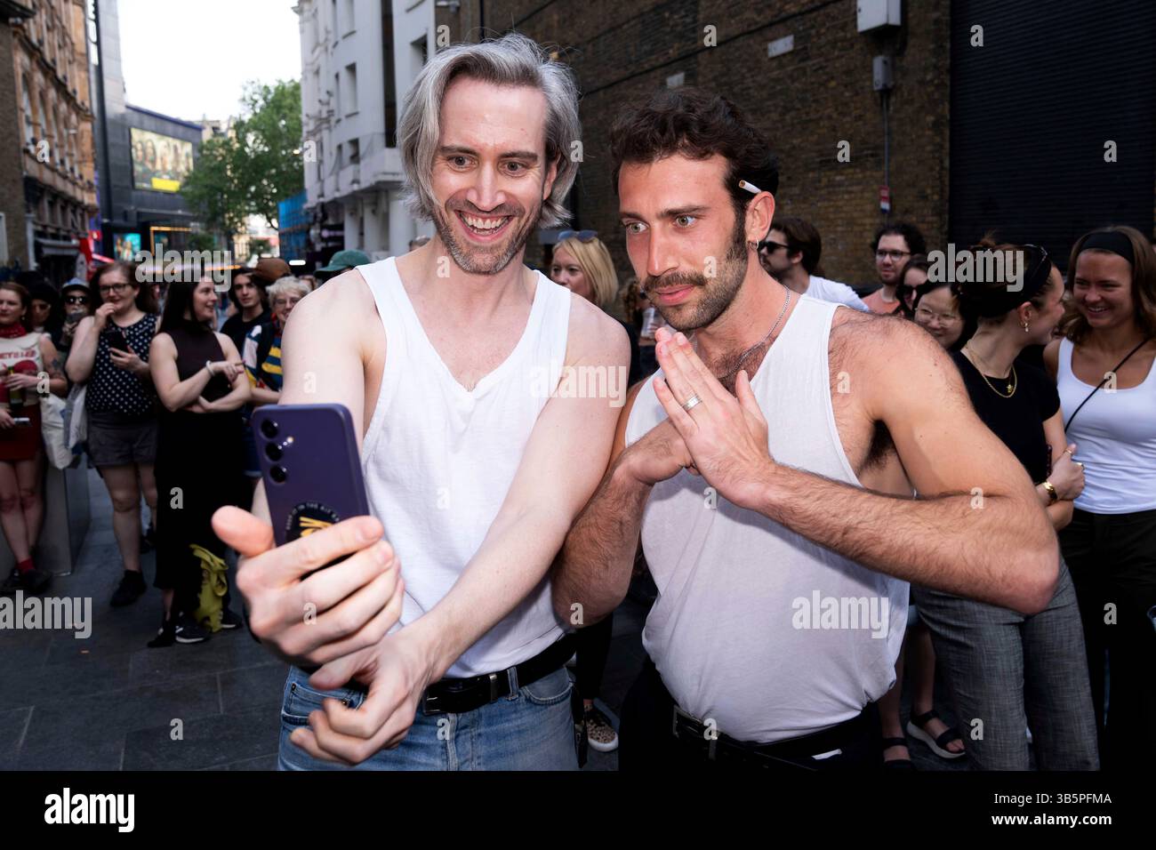 Competitors Patrick Doran, left, and Daniel Breuer take a selfie ...
