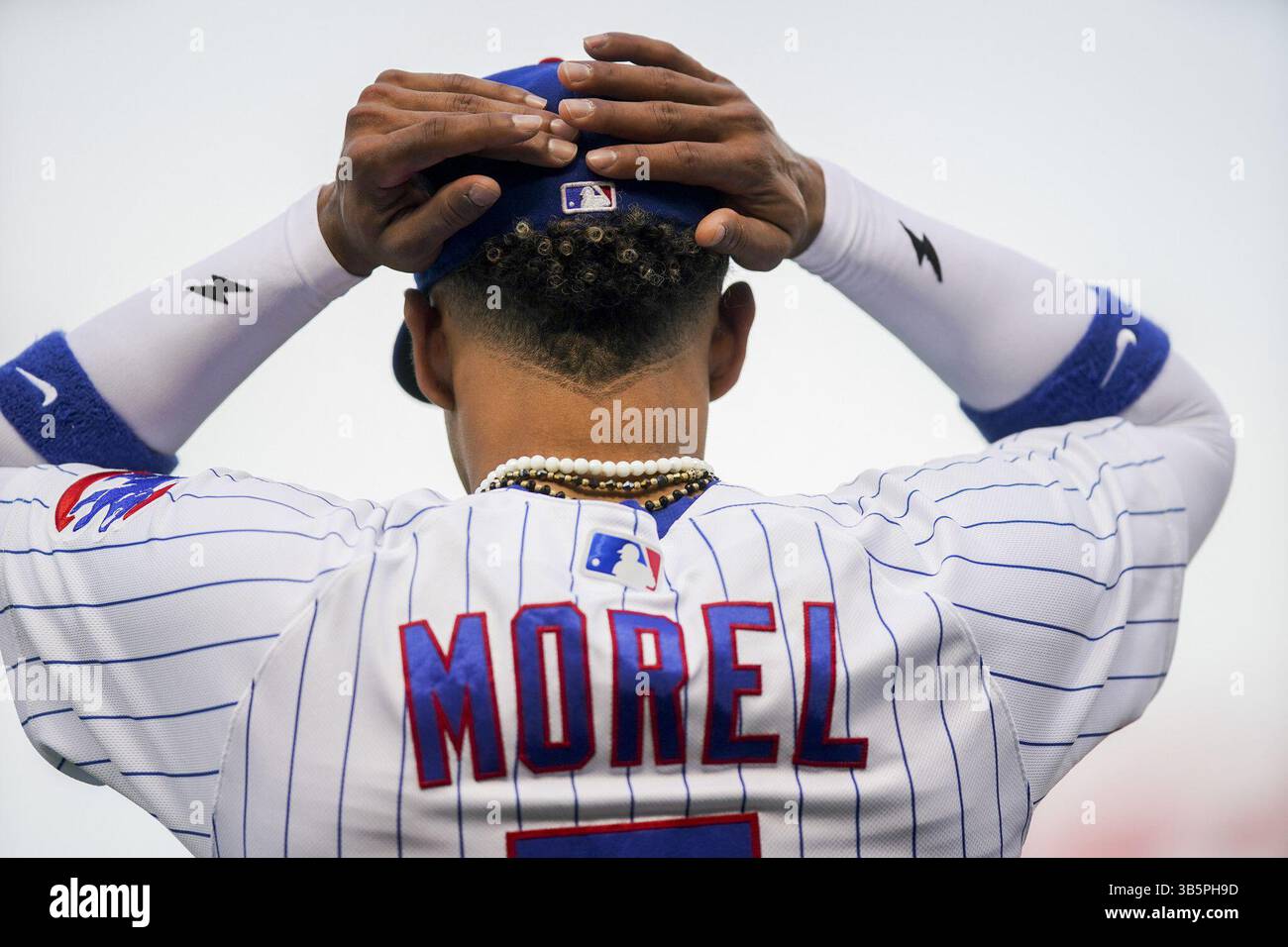 June 1, 2022: Christopher Morel puts on his Cubs hat before playing the ...