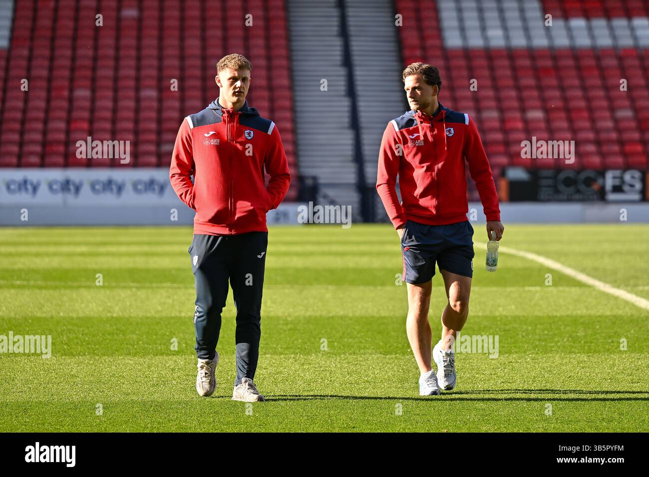 Glasgow, Scotland, UK. 2nd May, 2025. Raith Rovers players pitchside ...