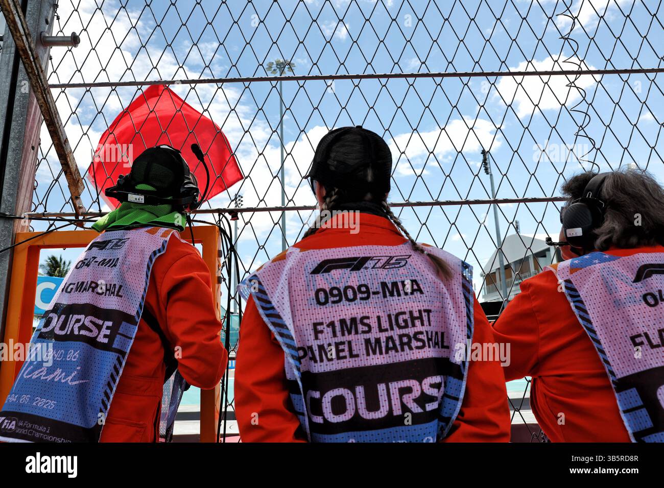 Miami, USA. 02nd May, 2025. Circuit atmosphere - marshals wave a red ...