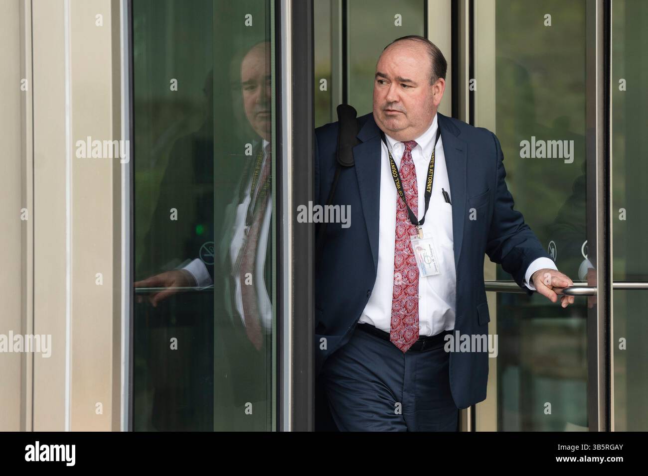 Will County Prosecutor Christopher Koch exits the Will County ...