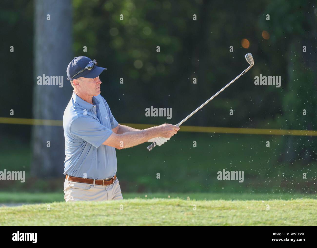 THE WOODLANDS, TX - MAY 02: Bob Estes watches his shot out of the trap ...