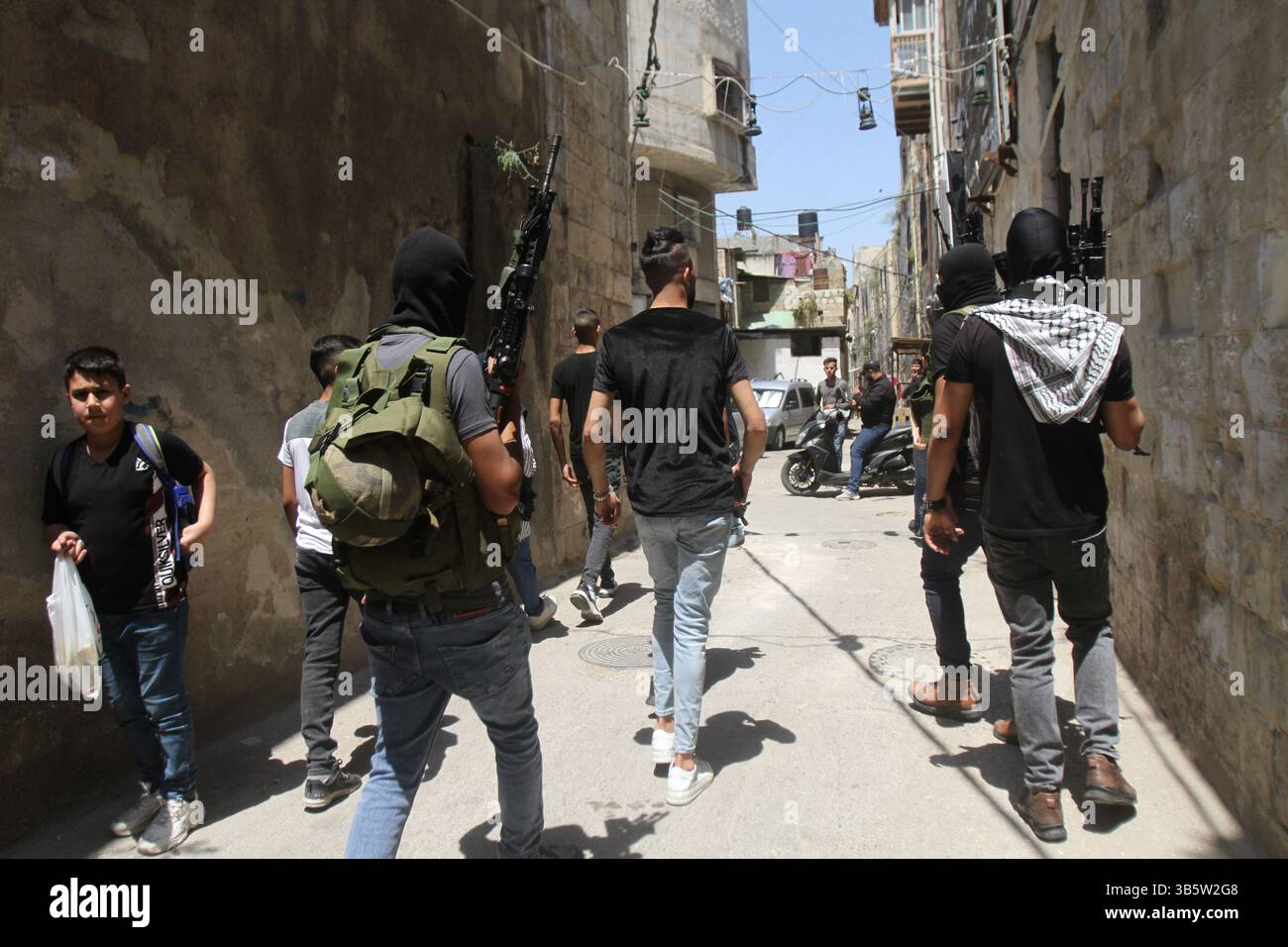 May 12, 2022, Nablus, West bank, Palestine: Masked Palestinian gunmen ...