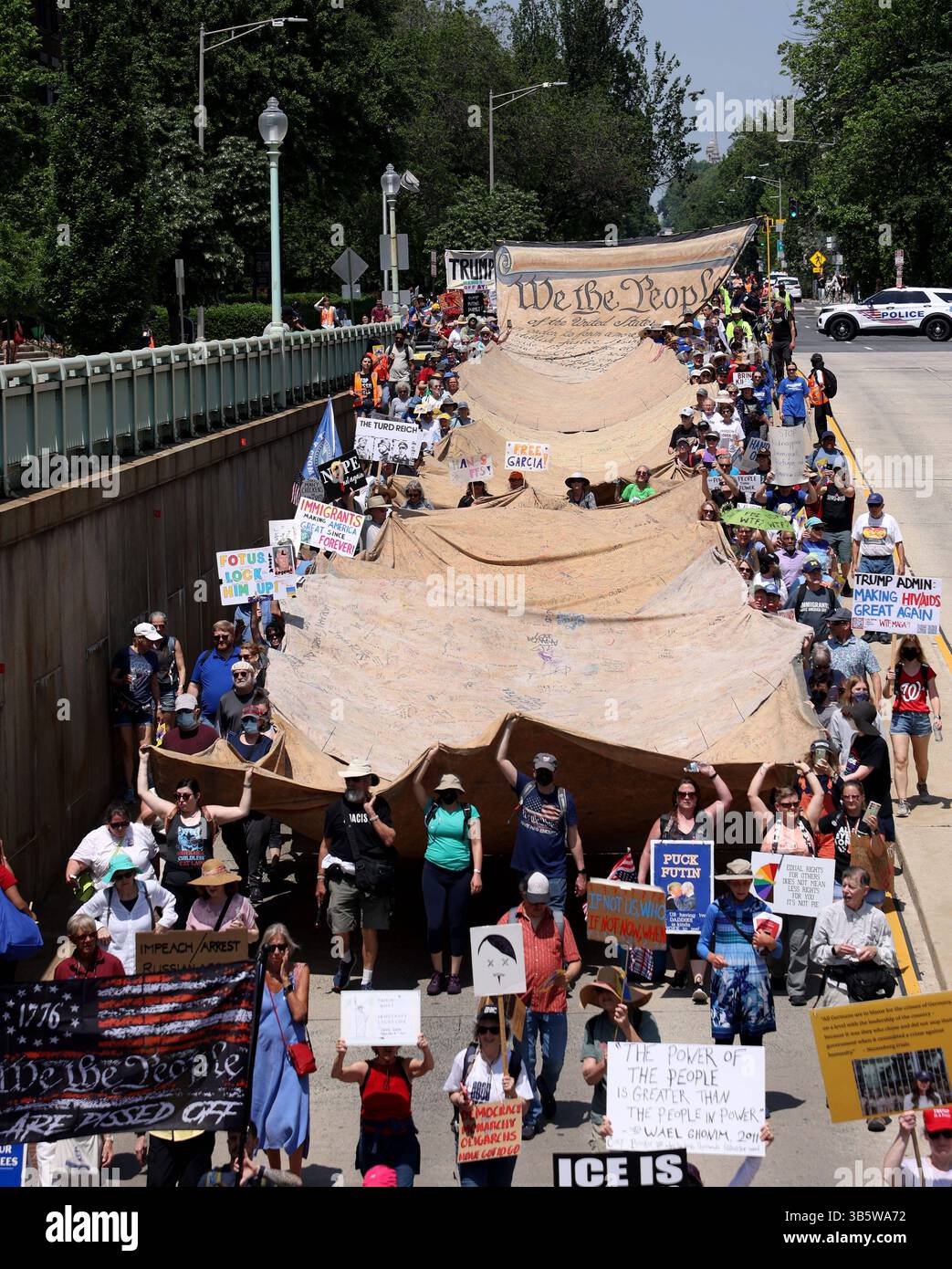 May Day Protest in Washington, USA - 01 May 2025. Demonstrators hold a ...