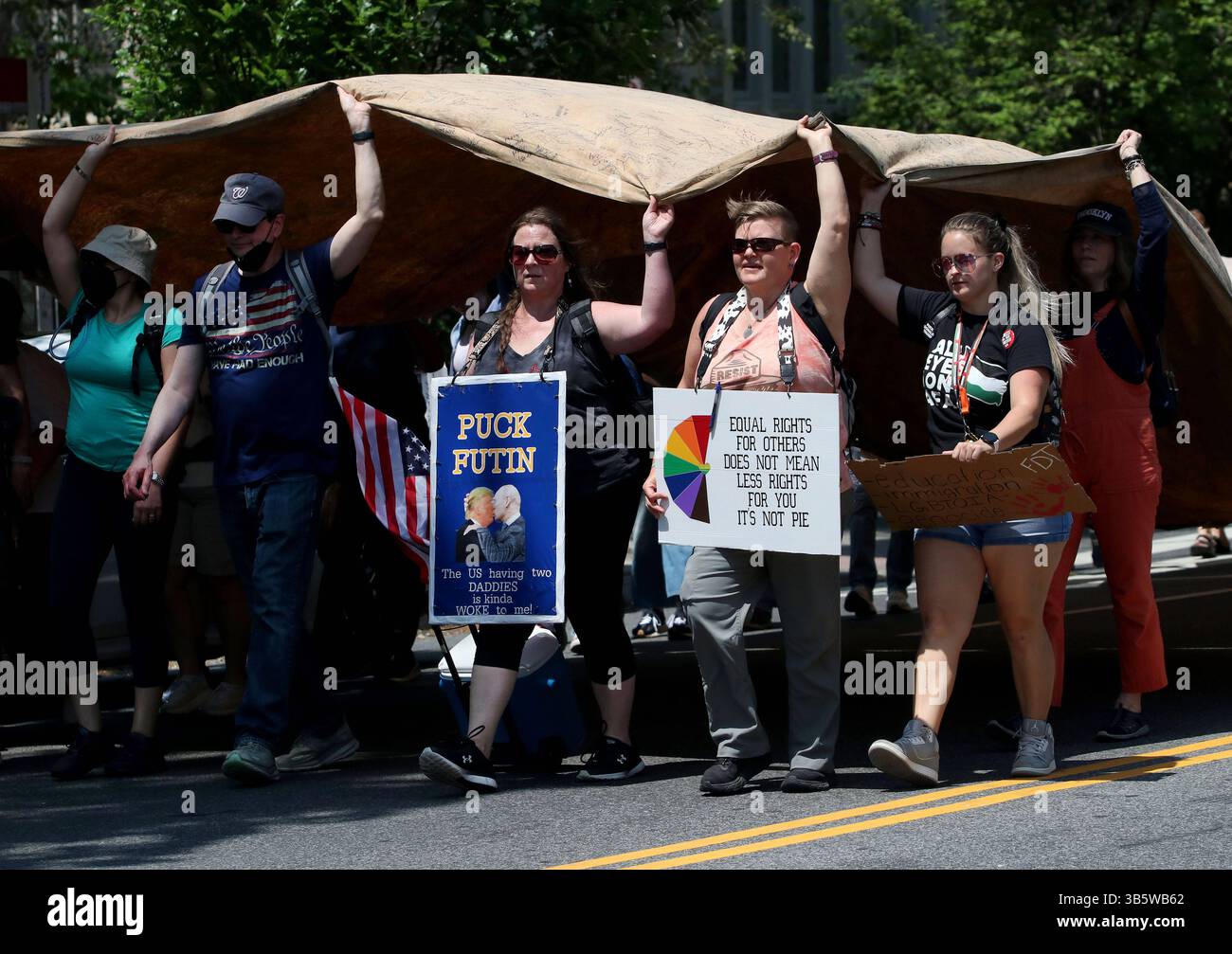 May Day Protest in Washington, USA - 01 May 2025. Demonstrators hold ...