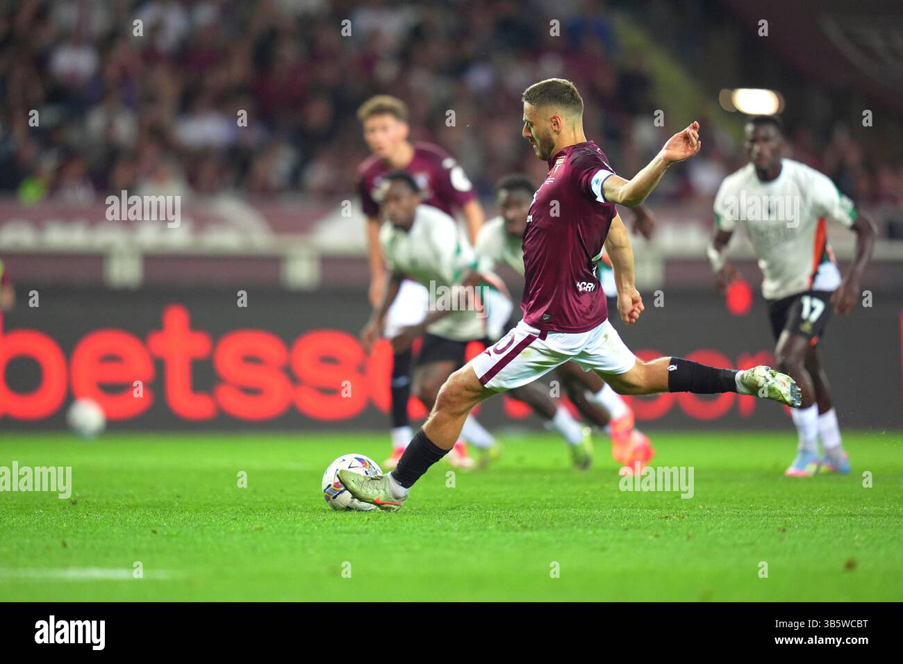 Torino's Nikola Vlasic scores from the penalty spot during the Serie A ...