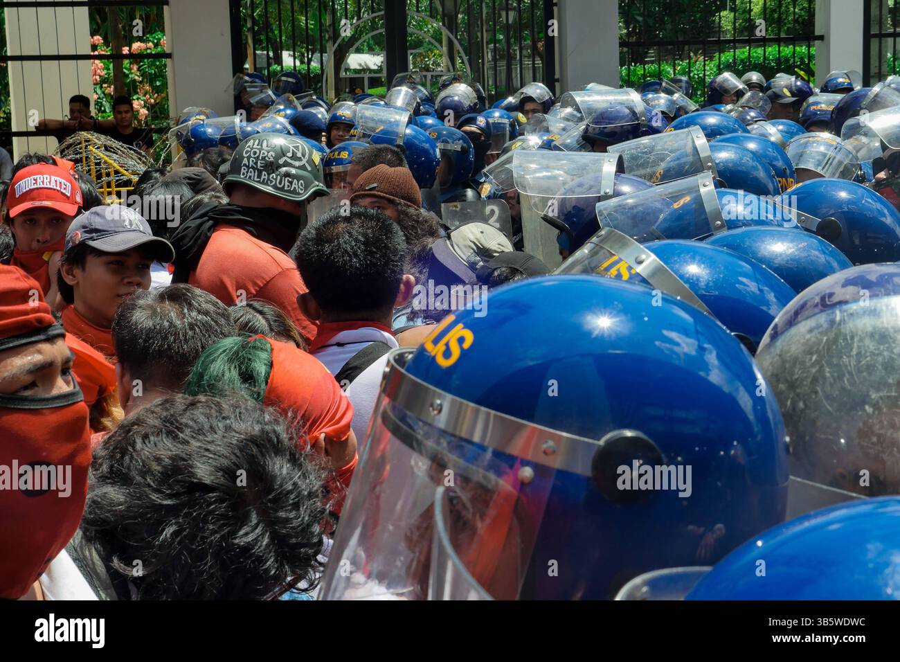 Labour day protest in Manila, Philippines Protestors clash with police ...