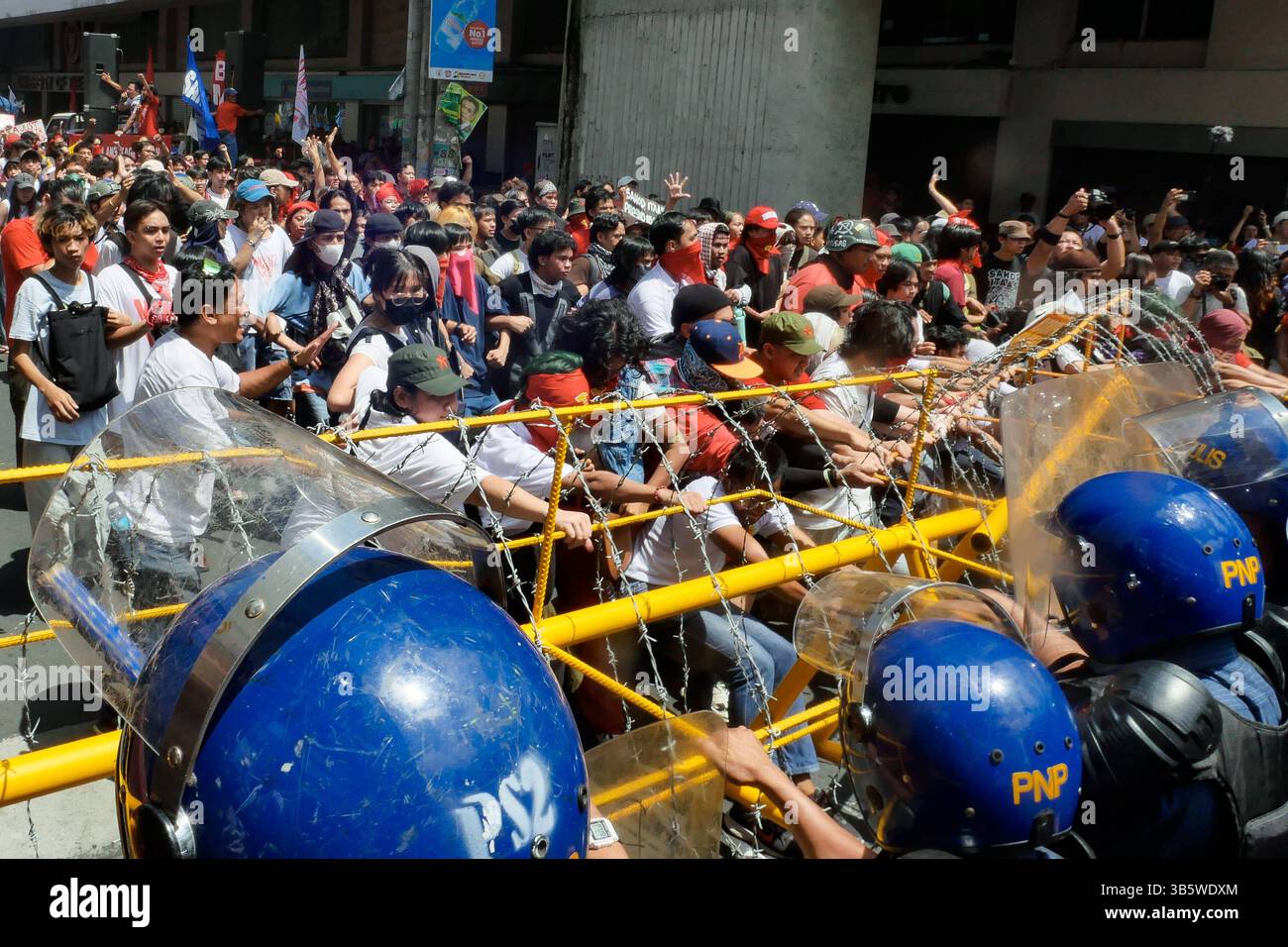 Labour day protest in Manila, Philippines Protestors clash with police ...
