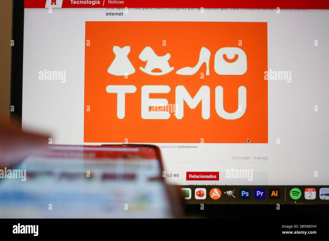 Carabanchel, Spain, May 2, 2025: A user uses the Temu app on a mobile ...