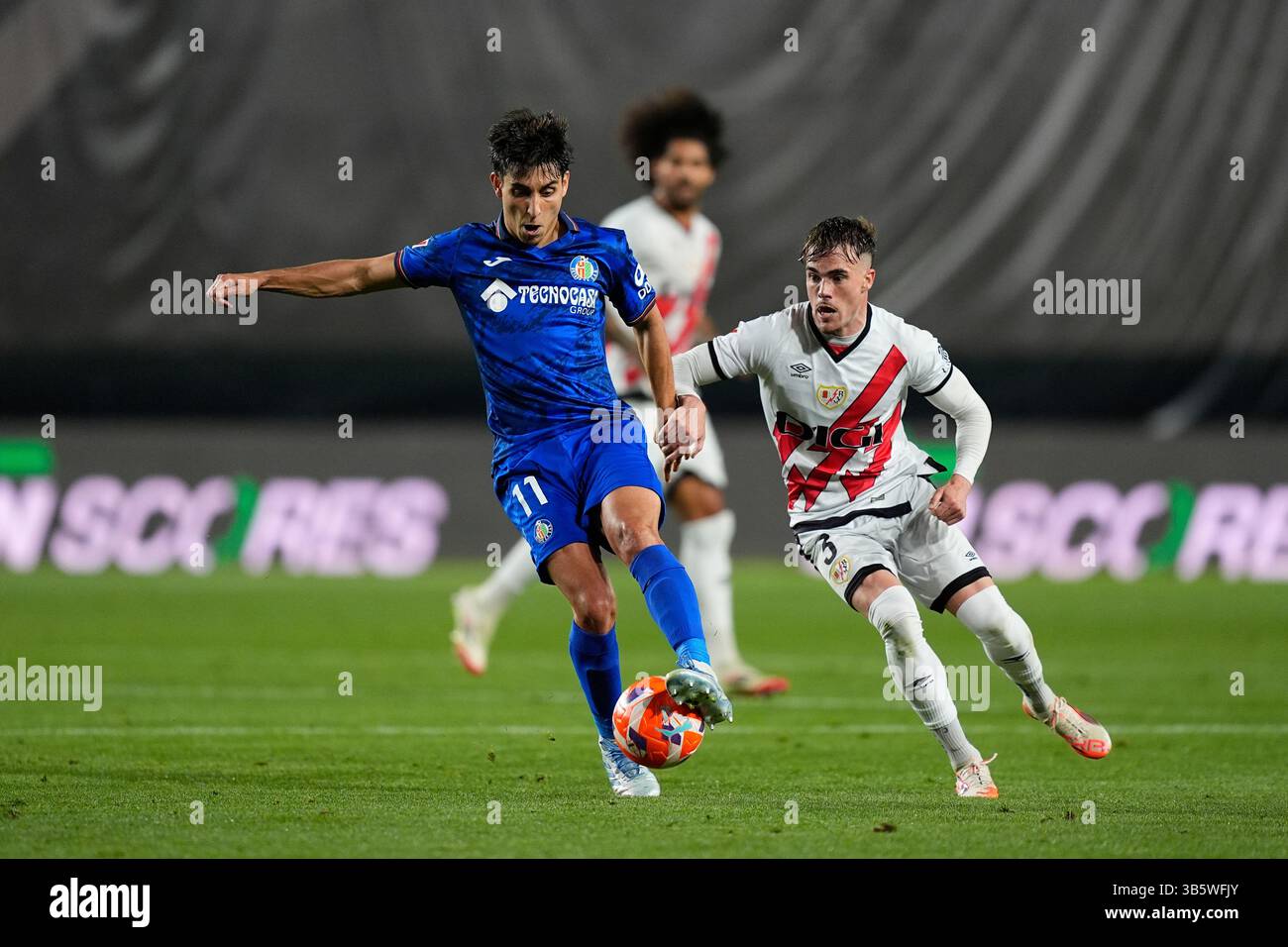 Ramon Terrats of Getafe CF and Pep Chavarria of Rayo Vallecano in ...
