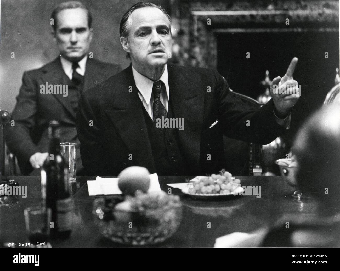 The Godfather (1972) Marlon Brando as Don Vito Corleone Robert Duvall as Tom Hagen *Filmstill ...