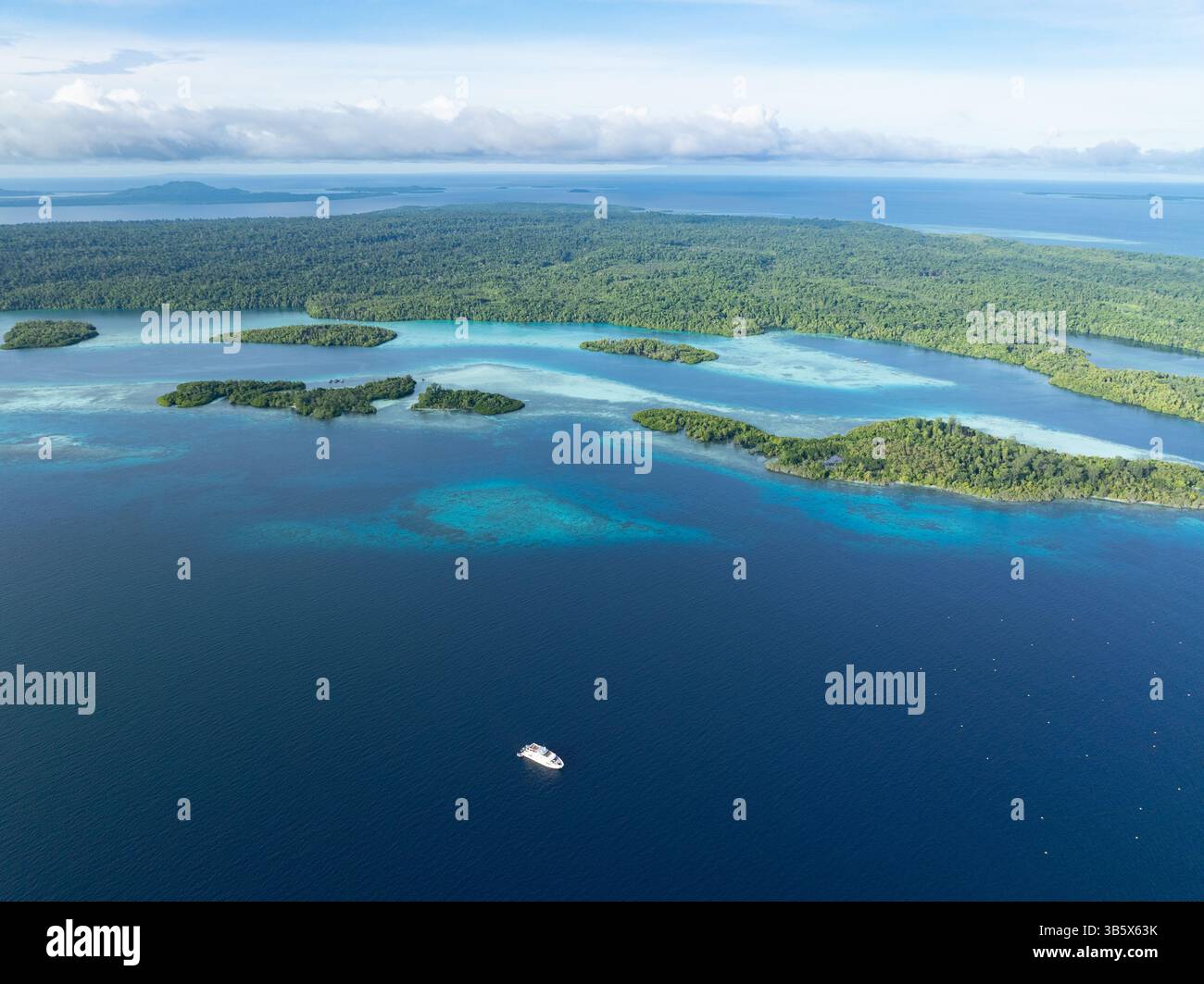 Healthy coral reefs surround beautiful islands off the southwest coast ...