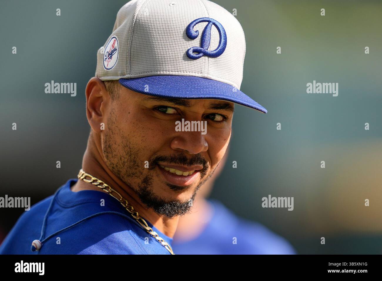 Los Angeles Dodgers shortstop Mookie Betts warms up before a baseball ...