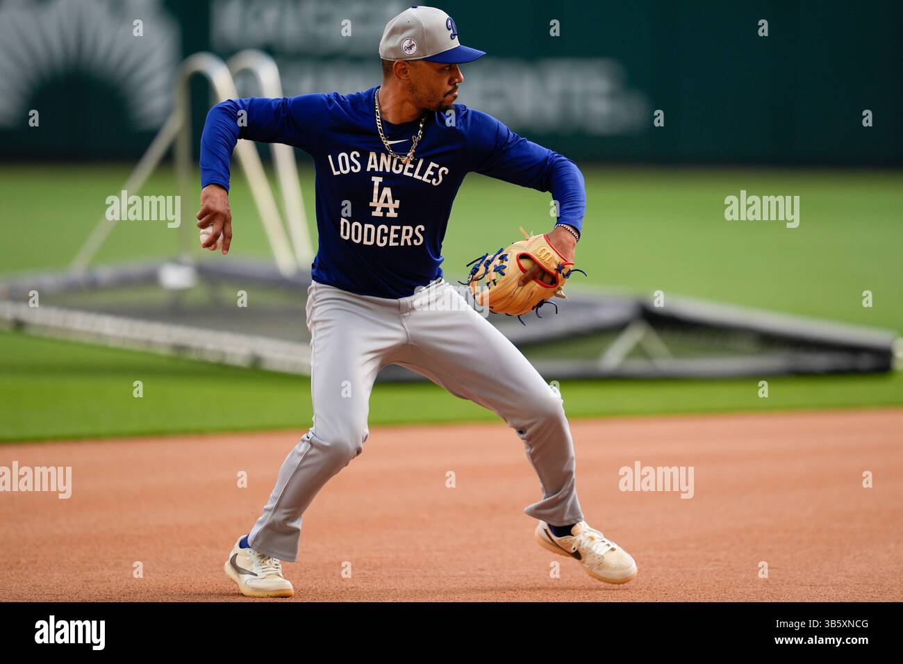 Los Angeles Dodgers shortstop Mookie Betts warms up before a baseball ...