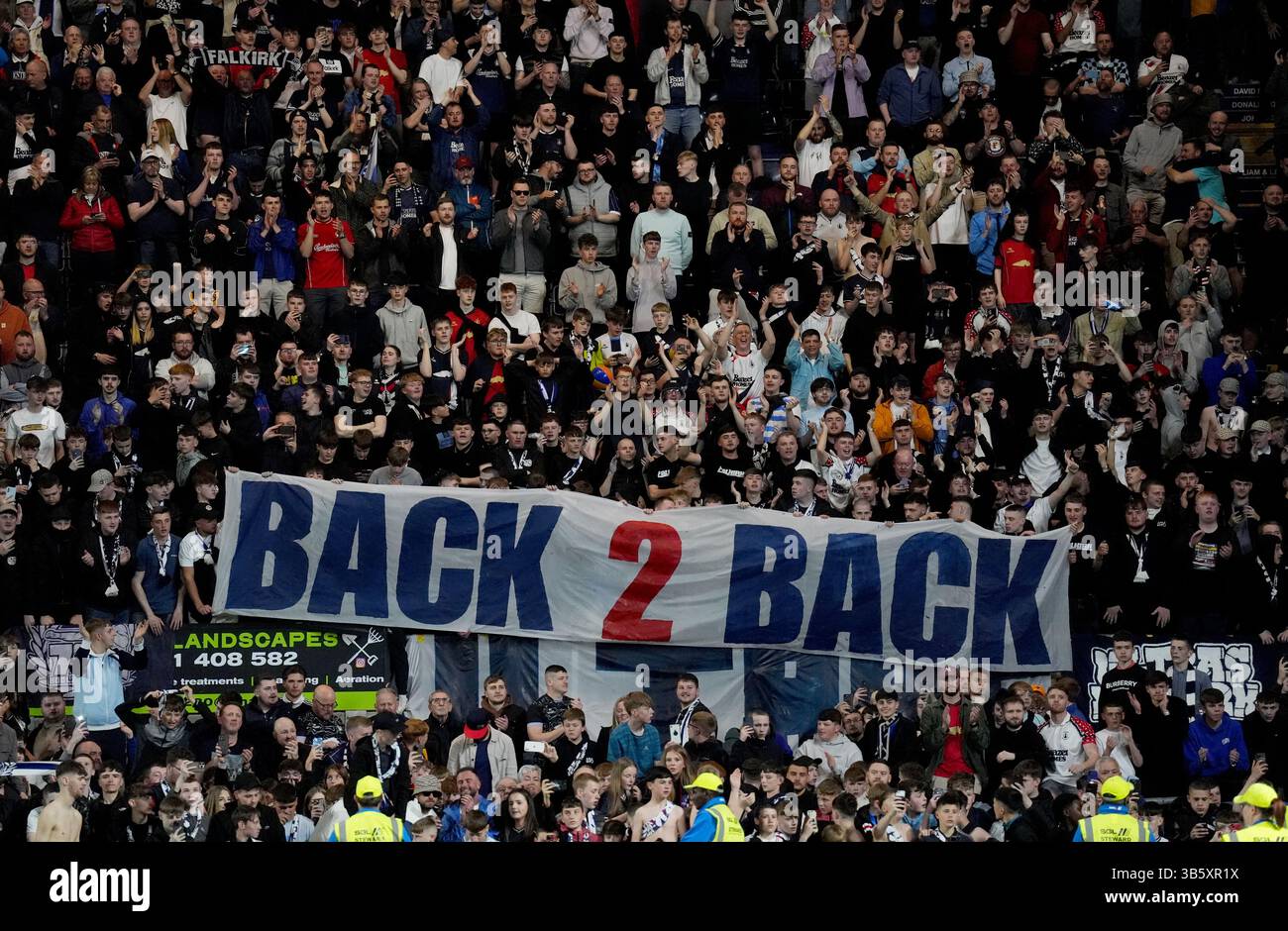 Falkirk fans hold up a banner at finale whistle after the William Hill ...