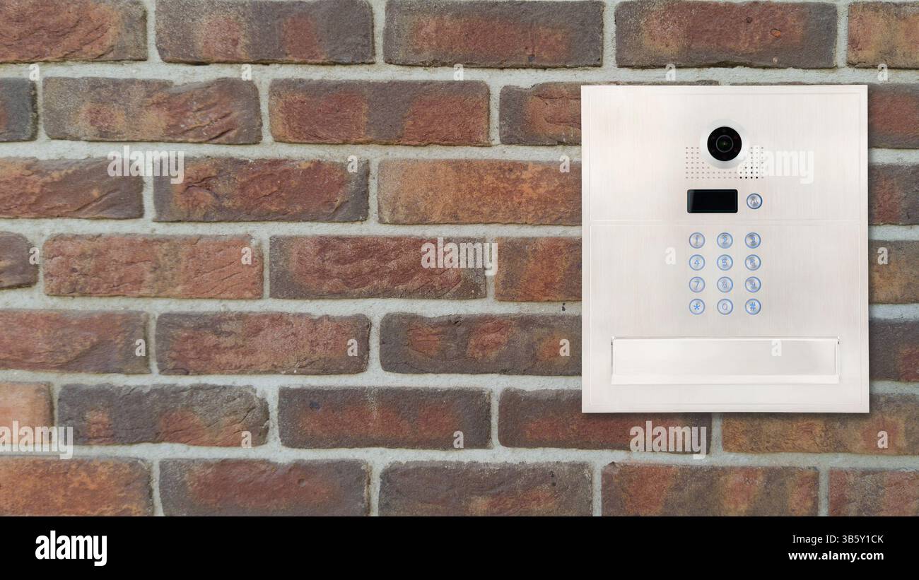 Modern Intercom Panel on Brick Wall Stock Photo - Alamy