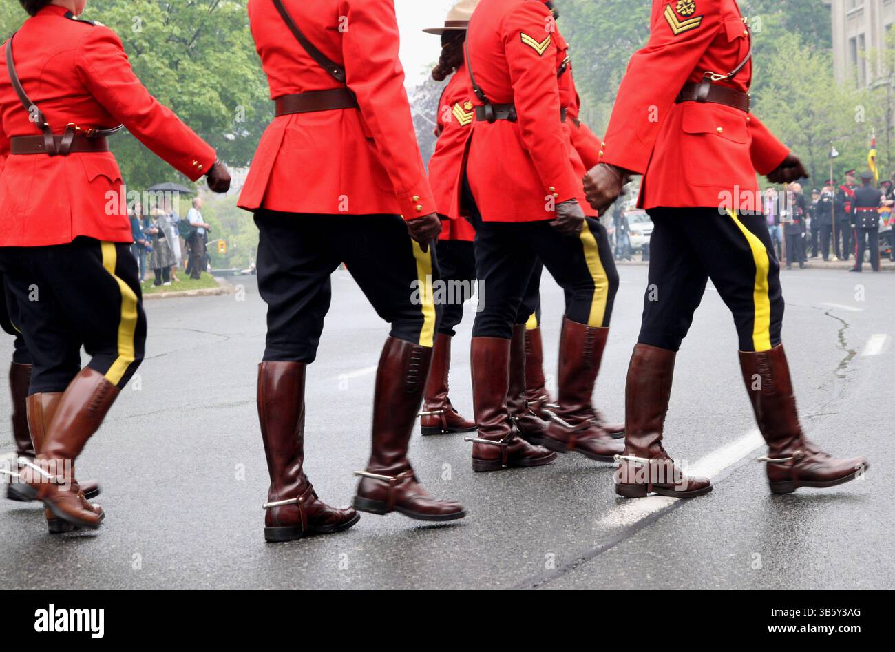 Toronto, Canada - Police in red RCMP uniforms march in a parade Stock ...