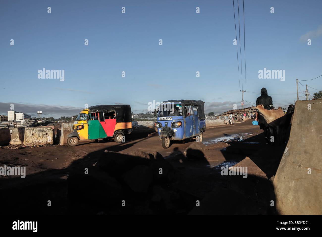 May 6, 2022, NAIROBI, KENYA: Tuk-tuk motors drive through the ...