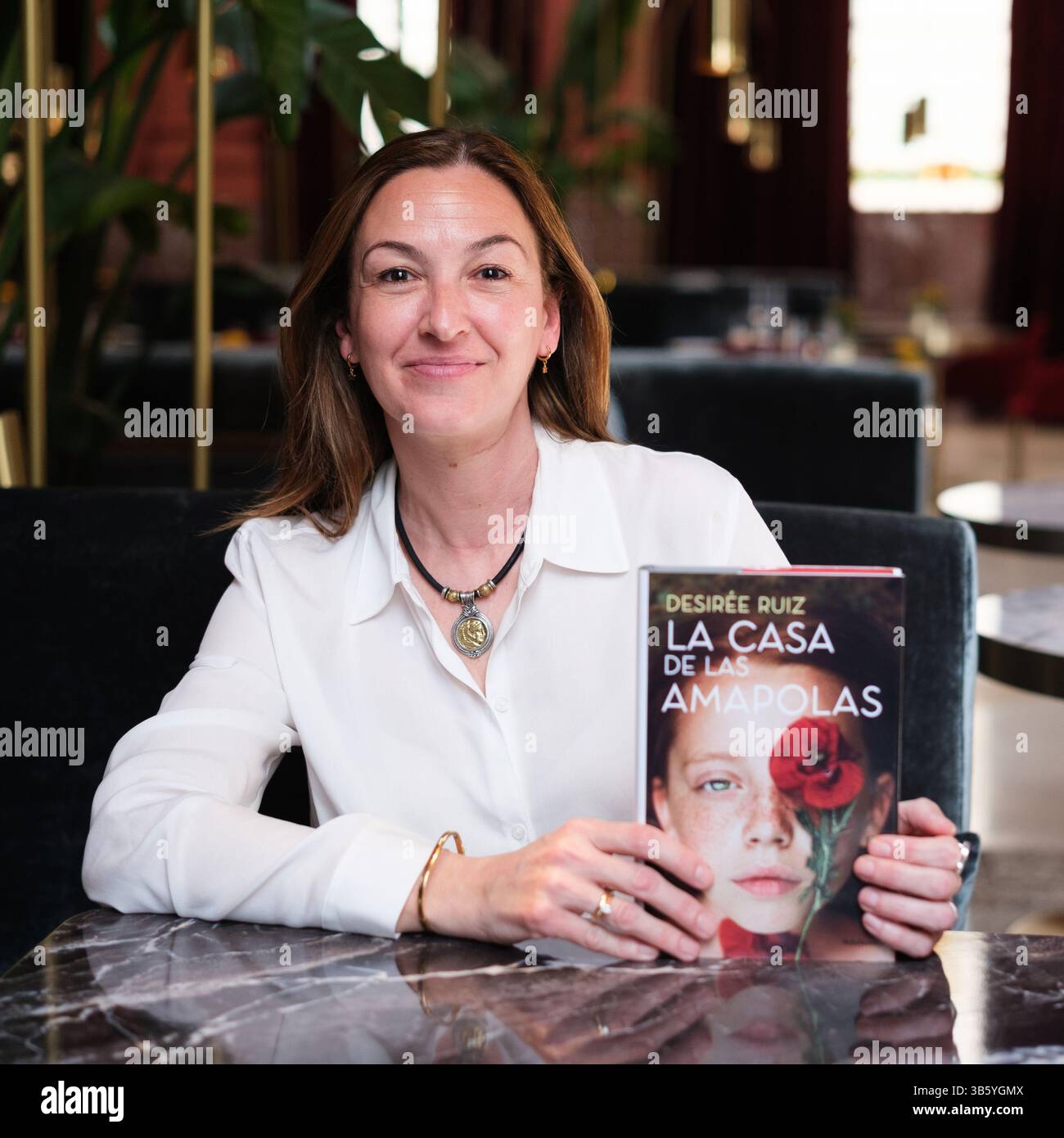 Writer Desiree Ruiz poses during the portrait session during the ...