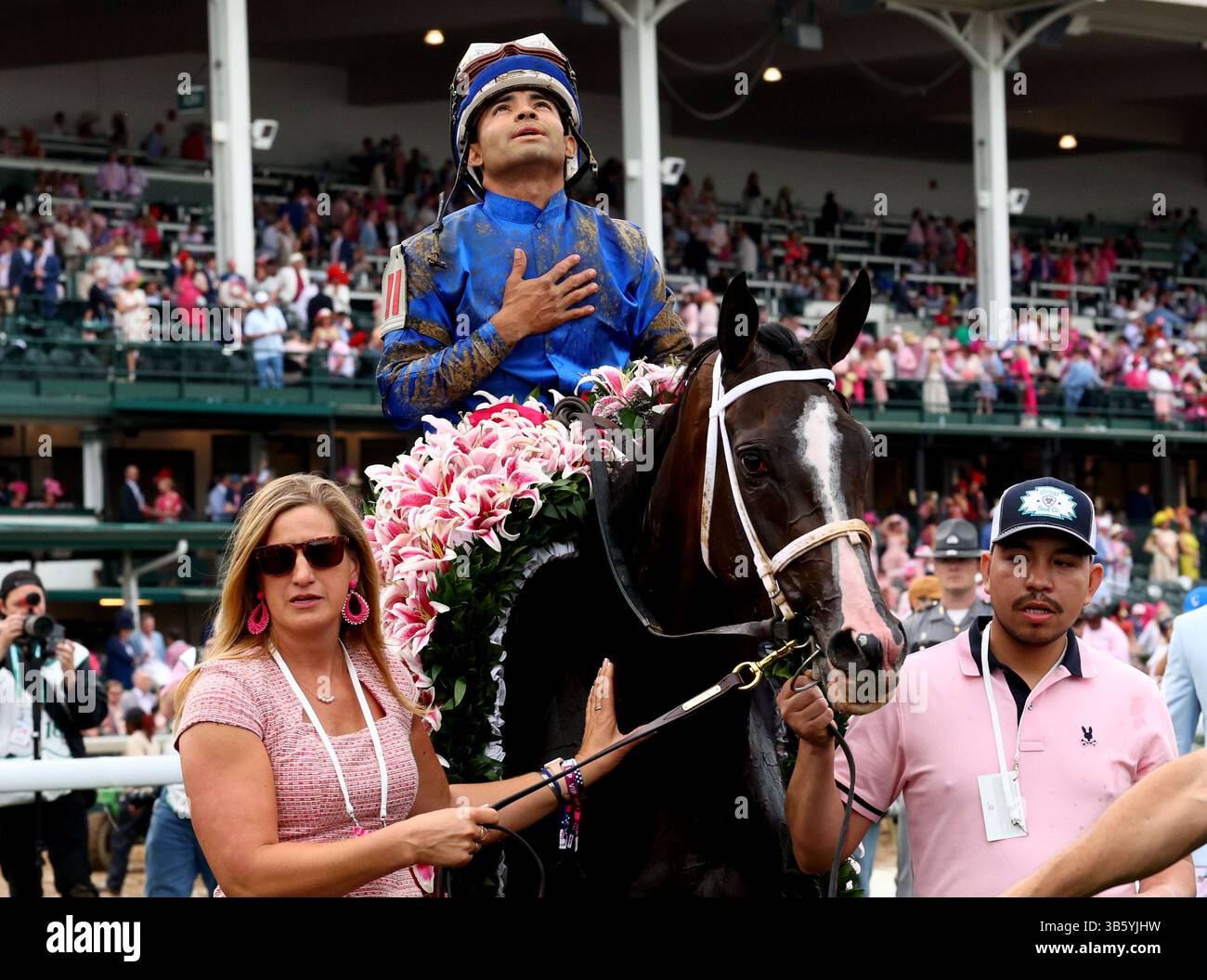 Louisville, United States. 02nd May, 2025. Jockey Luis Saez celebrate ...