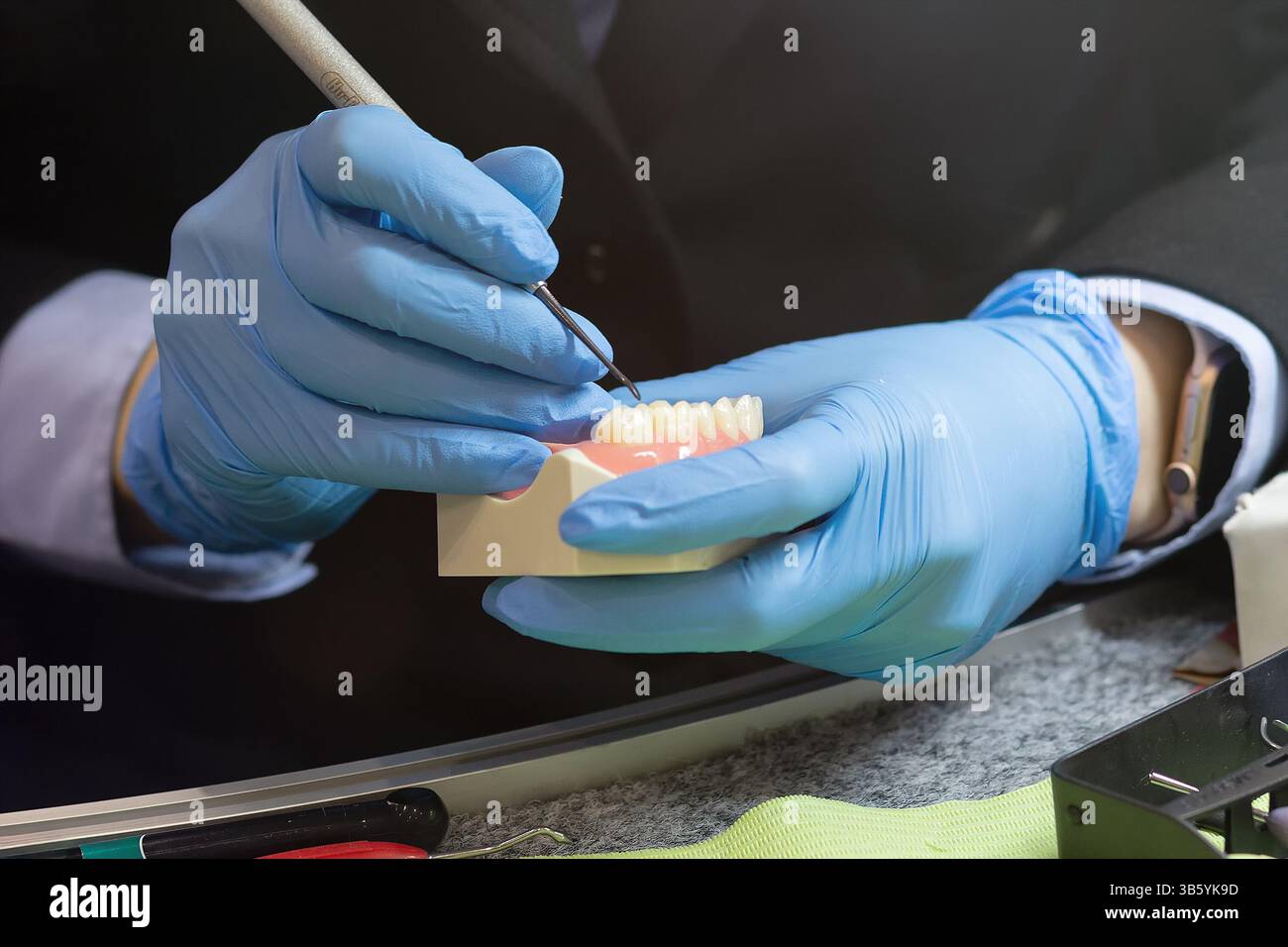 Dentist is working on facial dental prosthetic. Dantistry Stock Photo ...