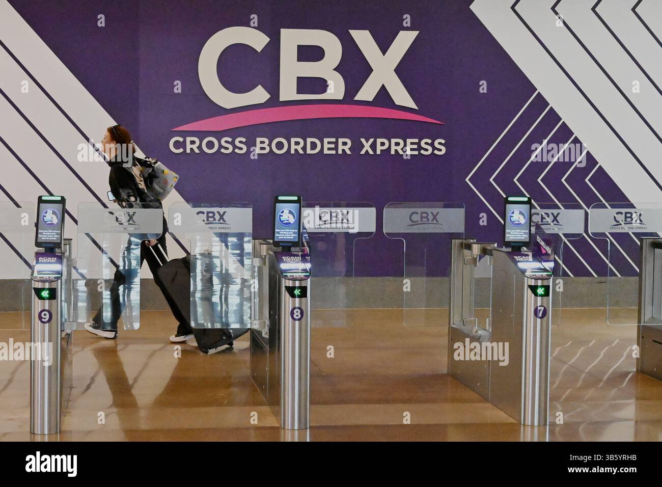 San Diego, USA. 02nd May, 2025. A passenger heads to the Tijuana airport while using the CBX ...