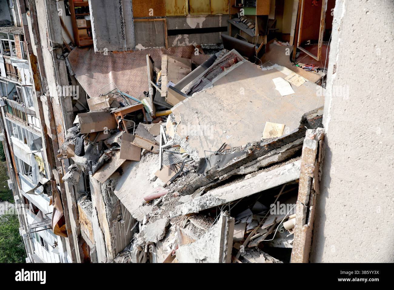 A residential building damaged by a nighttime Russian drone attack ...