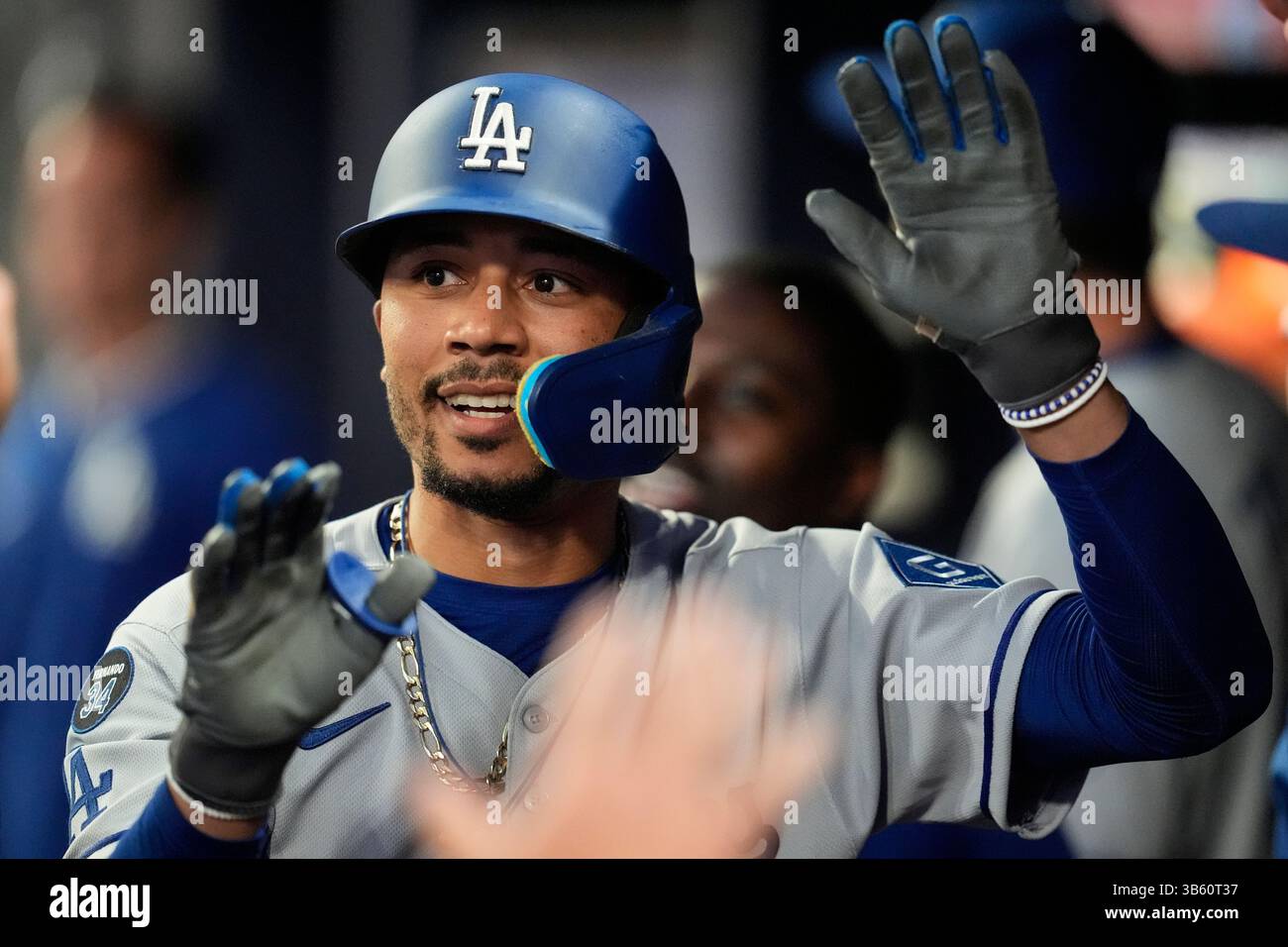 Los Angeles Dodgers' Mookie Betts (50) celebrates his solo homer ...