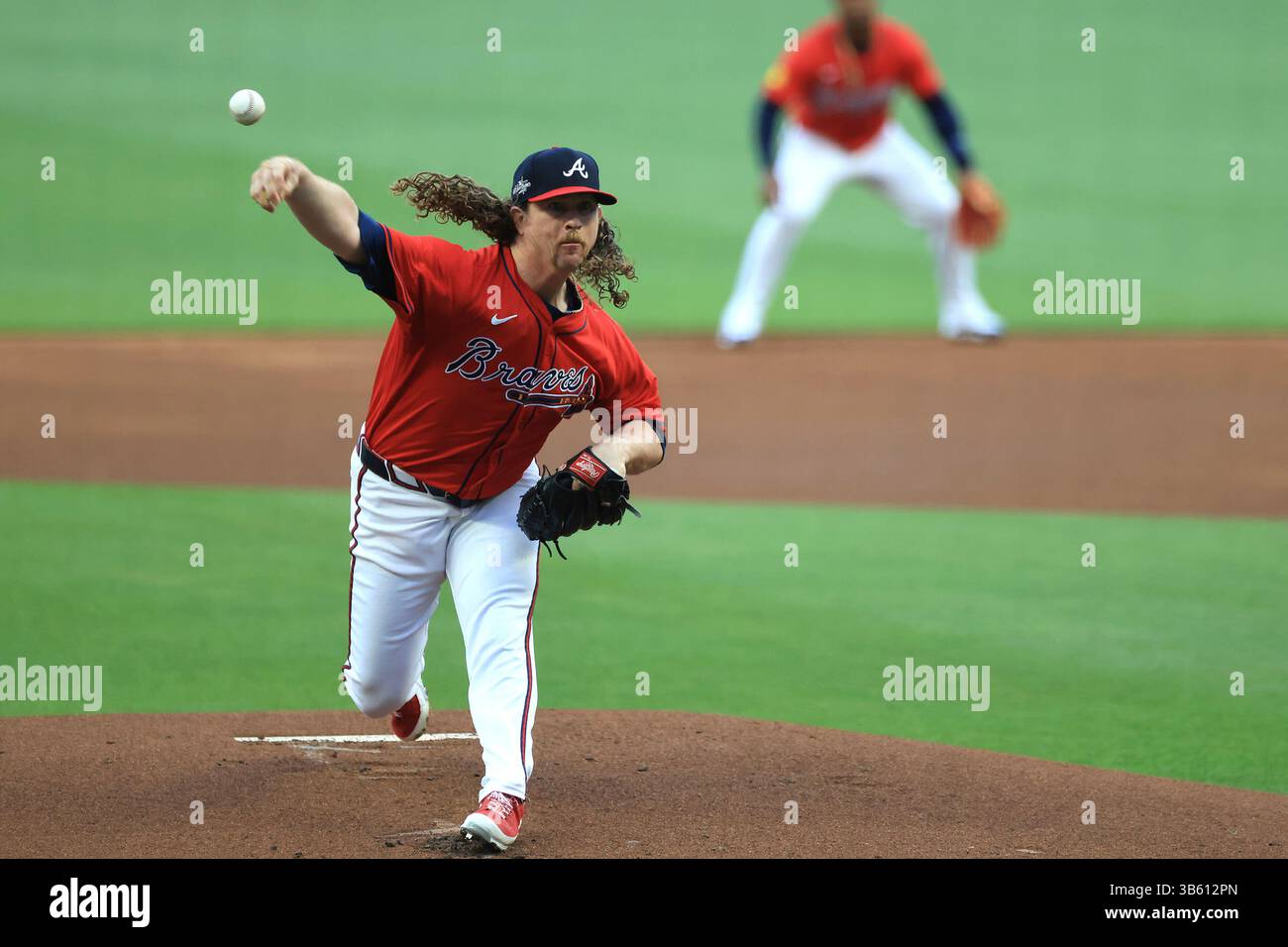 ATLANTA, GA - MAY 02: Grant Holmes #66 of the Atlanta Braves delivers a ...