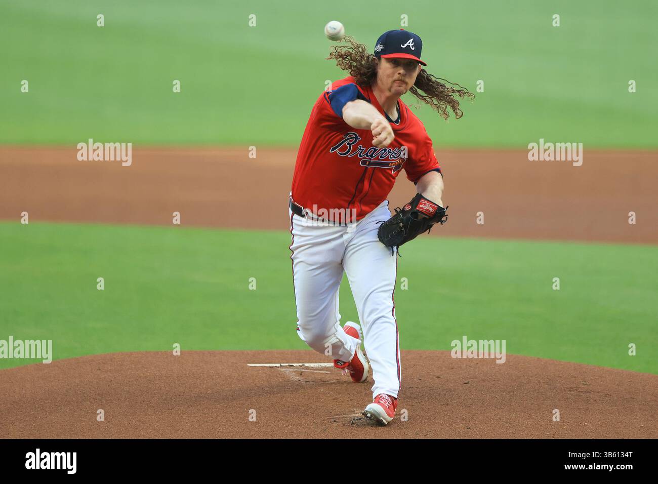 ATLANTA, GA - MAY 02: Grant Holmes #66 of the Atlanta Braves pitches ...