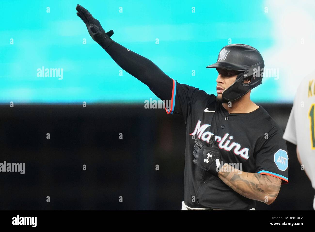 Miami Marlins' Agustín Ramírez (50) reacts after hitting a double ...