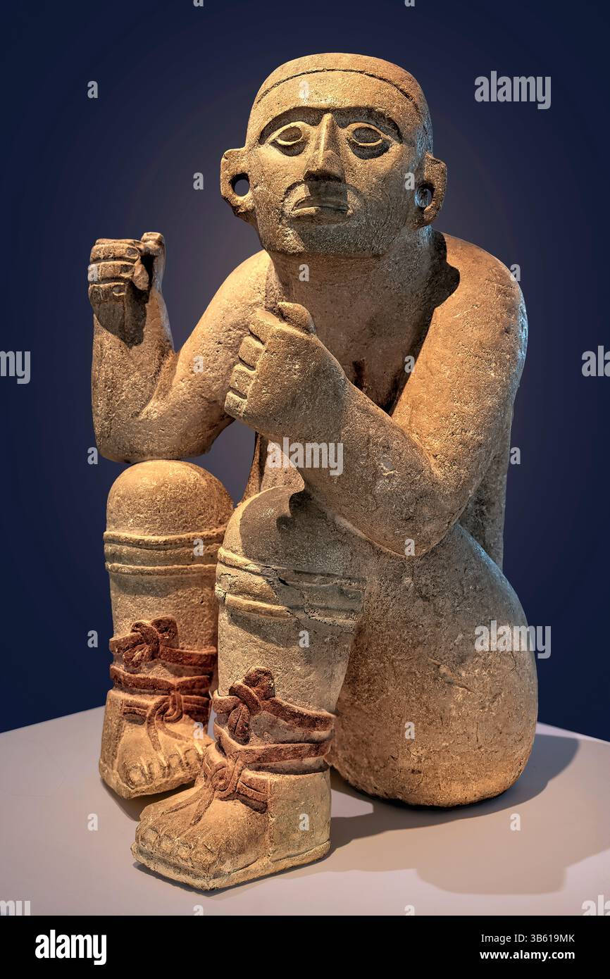 Seated Mayan figure os a standard bearer, stone carving, Yucatan ...