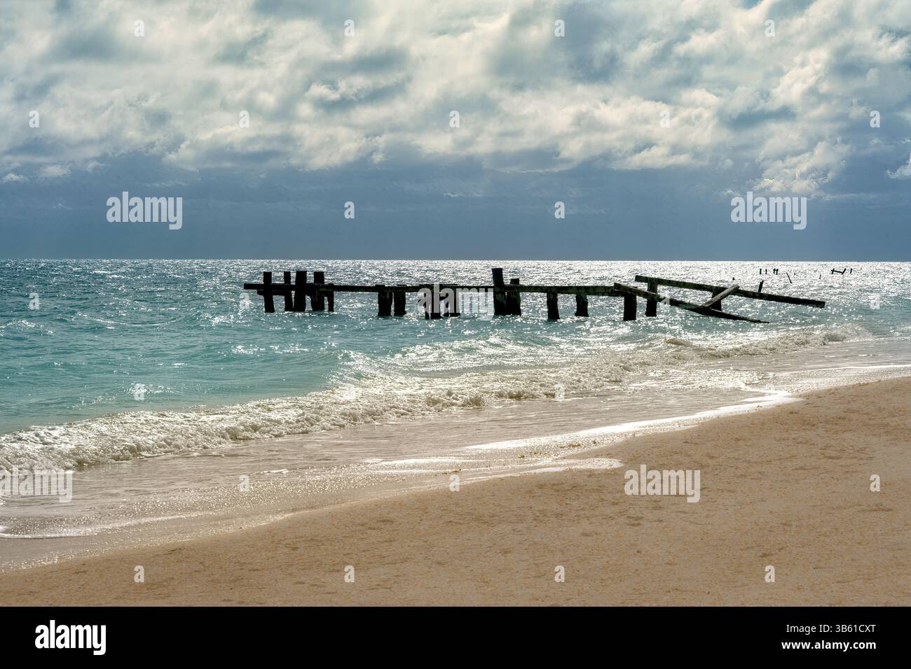 Broken pier piling on the beach at Punta Allen, Mexico Stock Photo - Alamy
