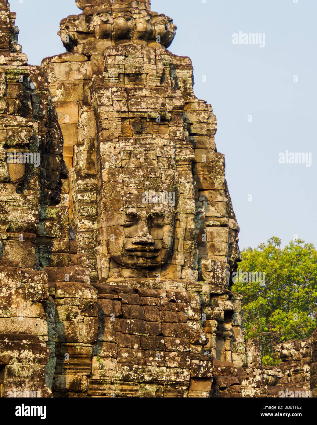 A carved face on a tower at Angkor Thom Temple Complex, Siem Reap ...