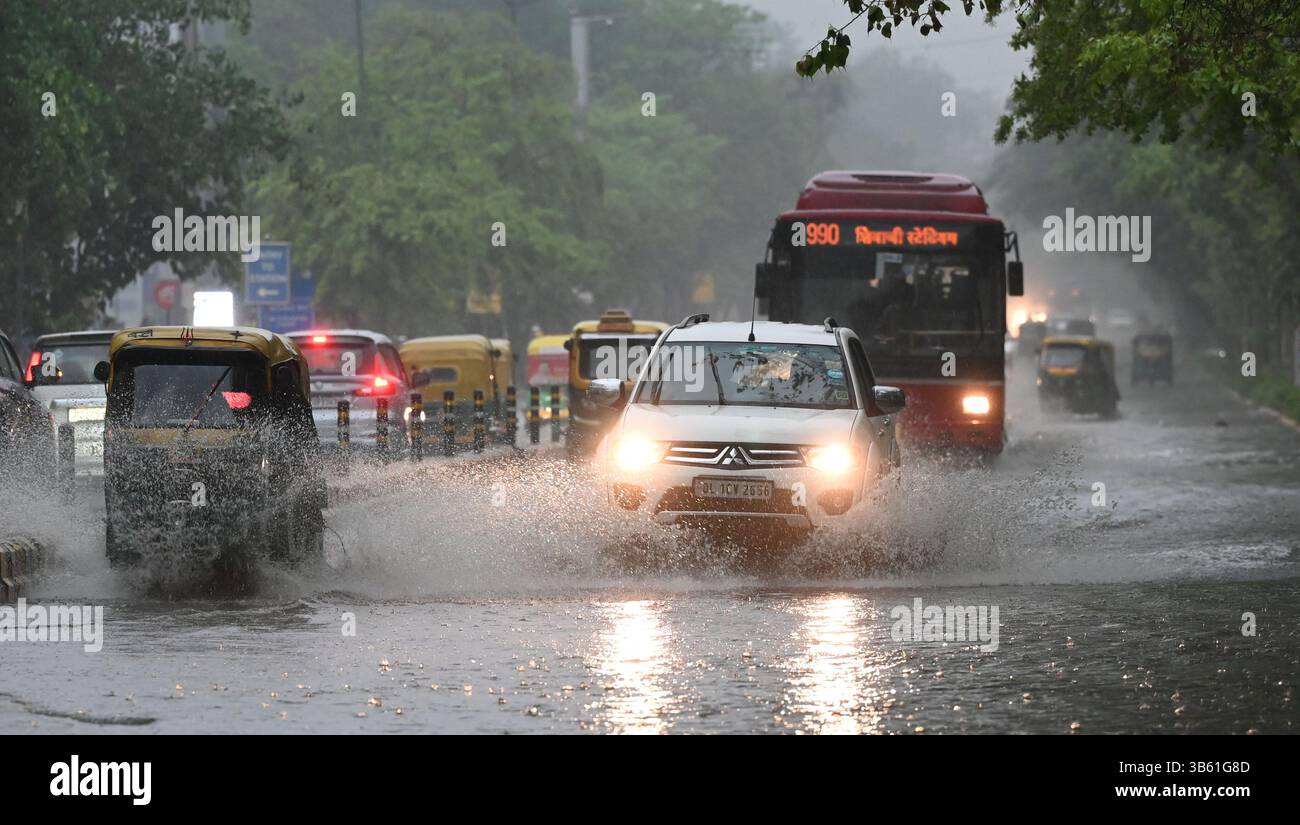 NEW DELHI, INDIA - MAY 2: Water Logging during heavy rain infront of the Shivaji Stadium Metro ...
