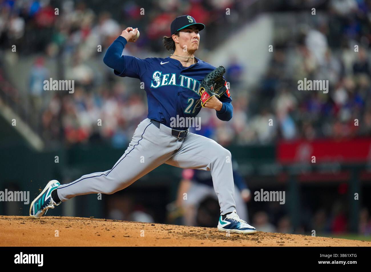 Seattle Mariners starting pitcher Bryan Woo throws a pitch to the Texas ...