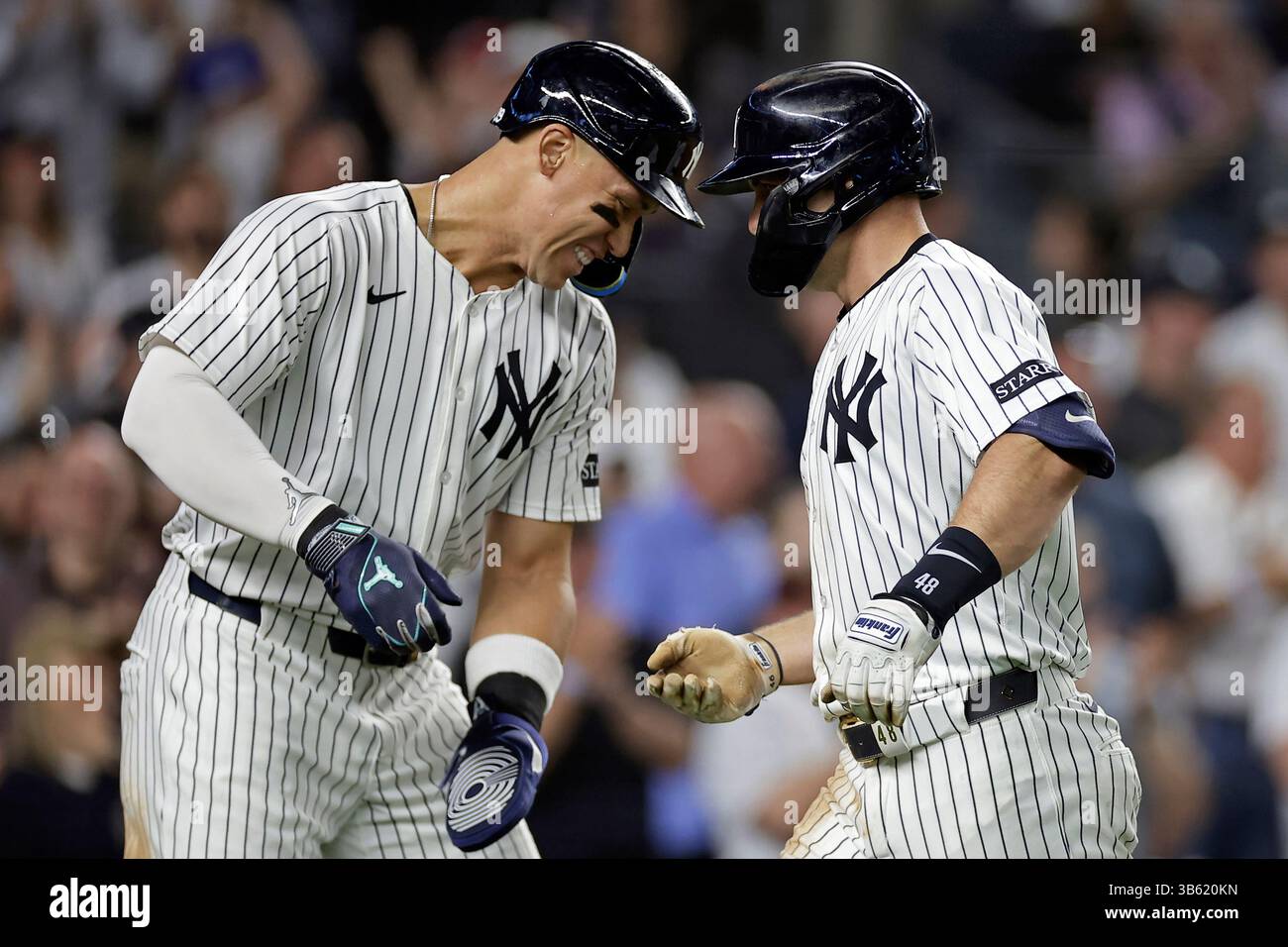 New York Yankees' Paul Goldschmidt is congratulated by Aaron Judge after hitting a three-run ...