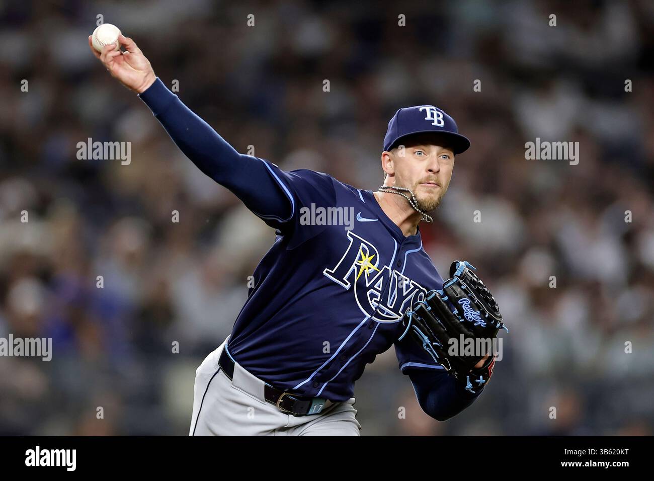 Tampa Bay Rays pitcher Eric Orze throws during the seventh inning of a ...