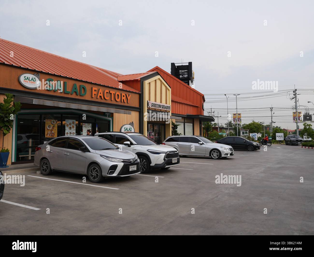 A mini mall on Srinagarindra-Romklao Road in Bangkok, Thailand. These ...