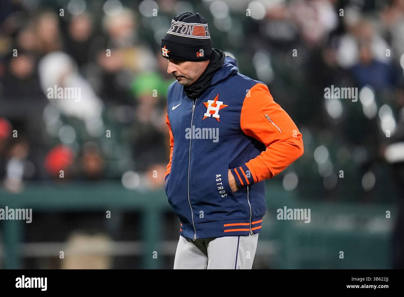 Houston Astros manager Joe Espada returns to the dugout after making a ...