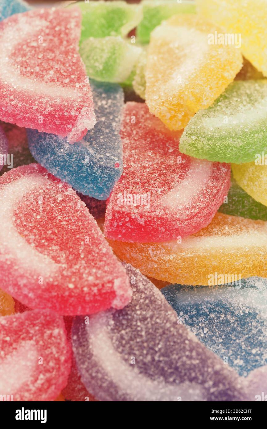 Colorful gummy candies piled together in a vibrant display Stock Photo ...