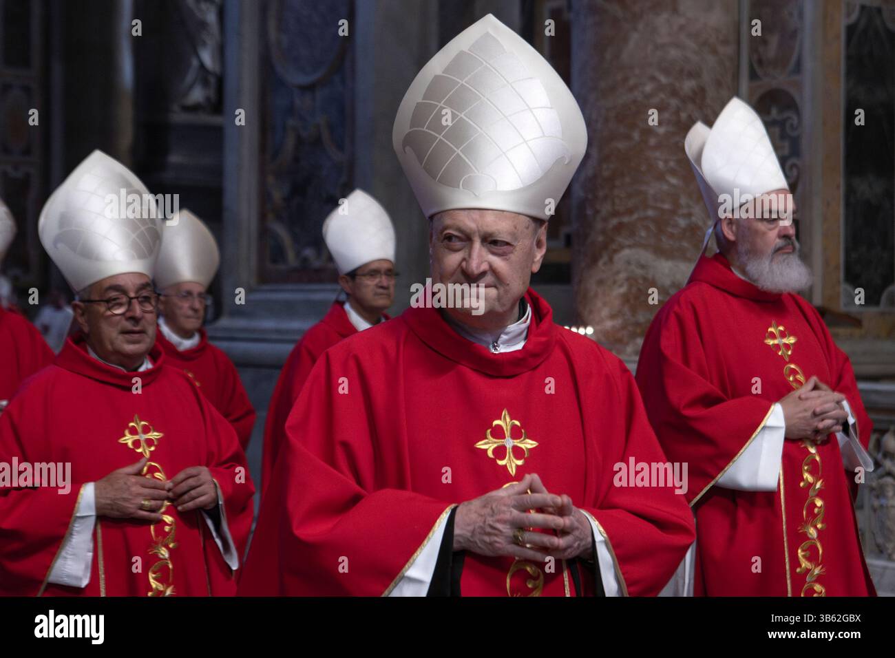 Cardinal Gianfranco Ravasi arrives for a mass on the seventh day of the ...