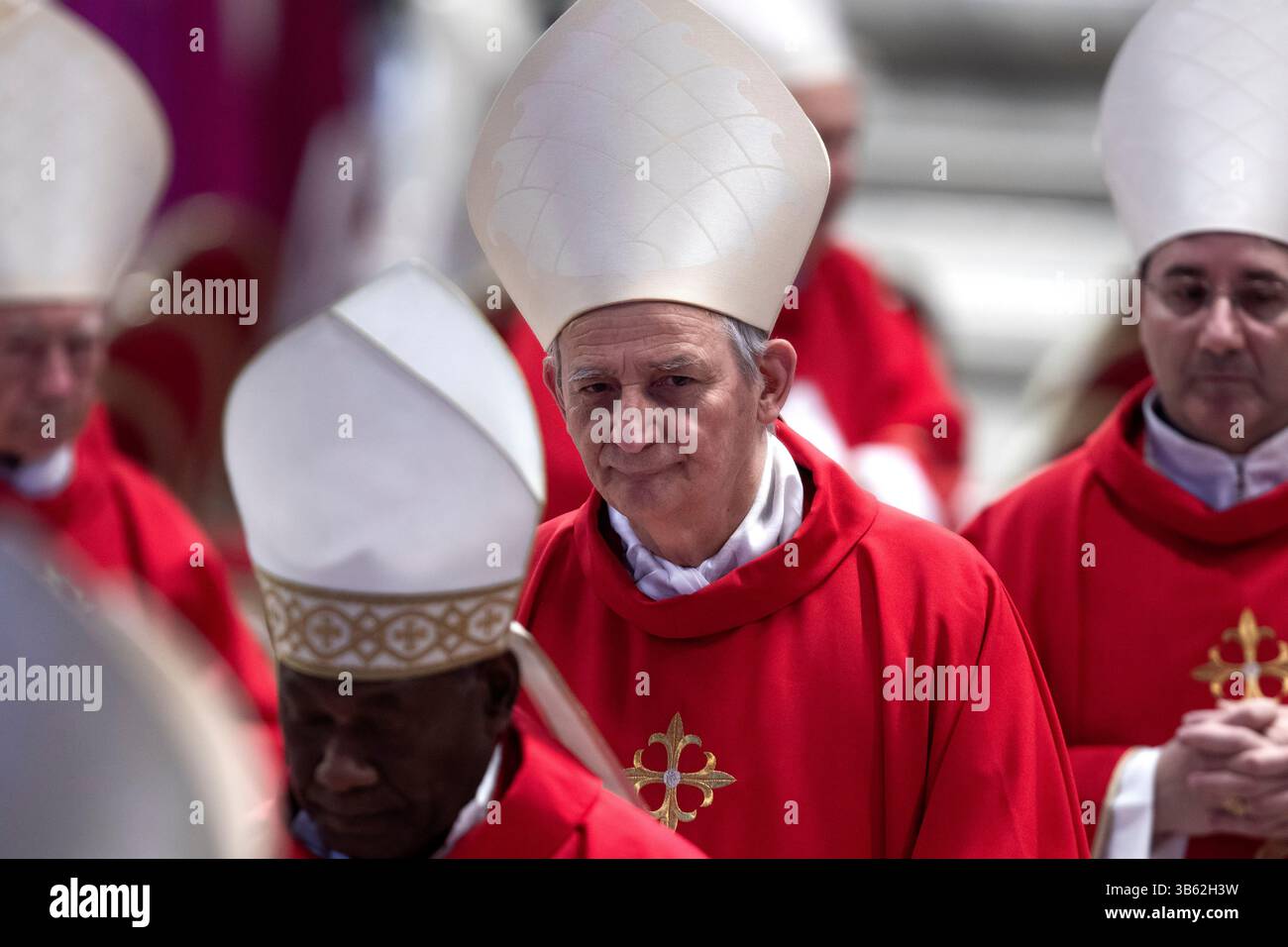 Cardinal Matteo Zuppi leaves at the end of a mass on the seventh day of ...