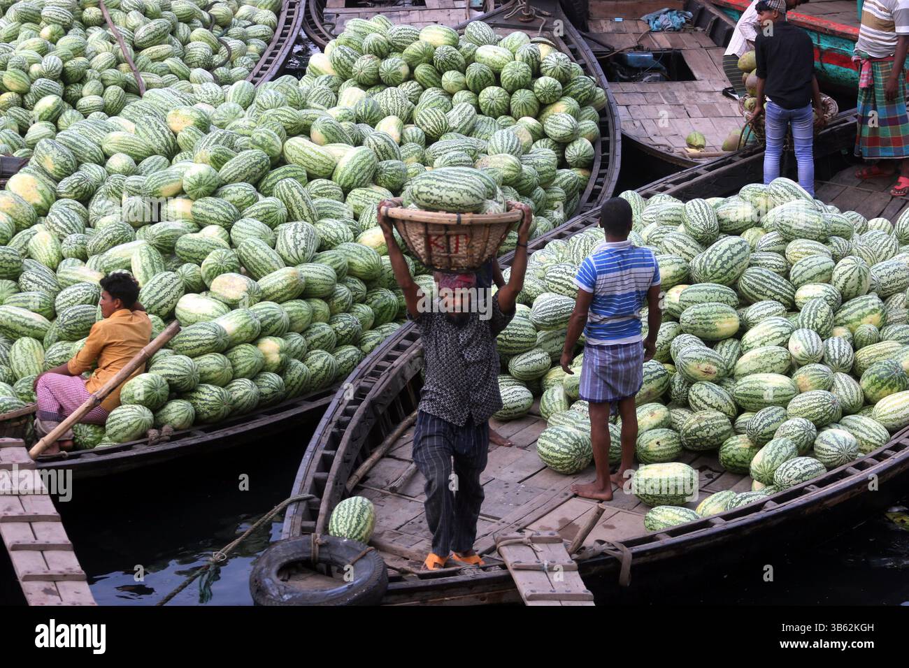 April 9, 2022, Dhaka, Bangladesh: Traders are bringing watermelon from Patuakhali to Dhaka by ...