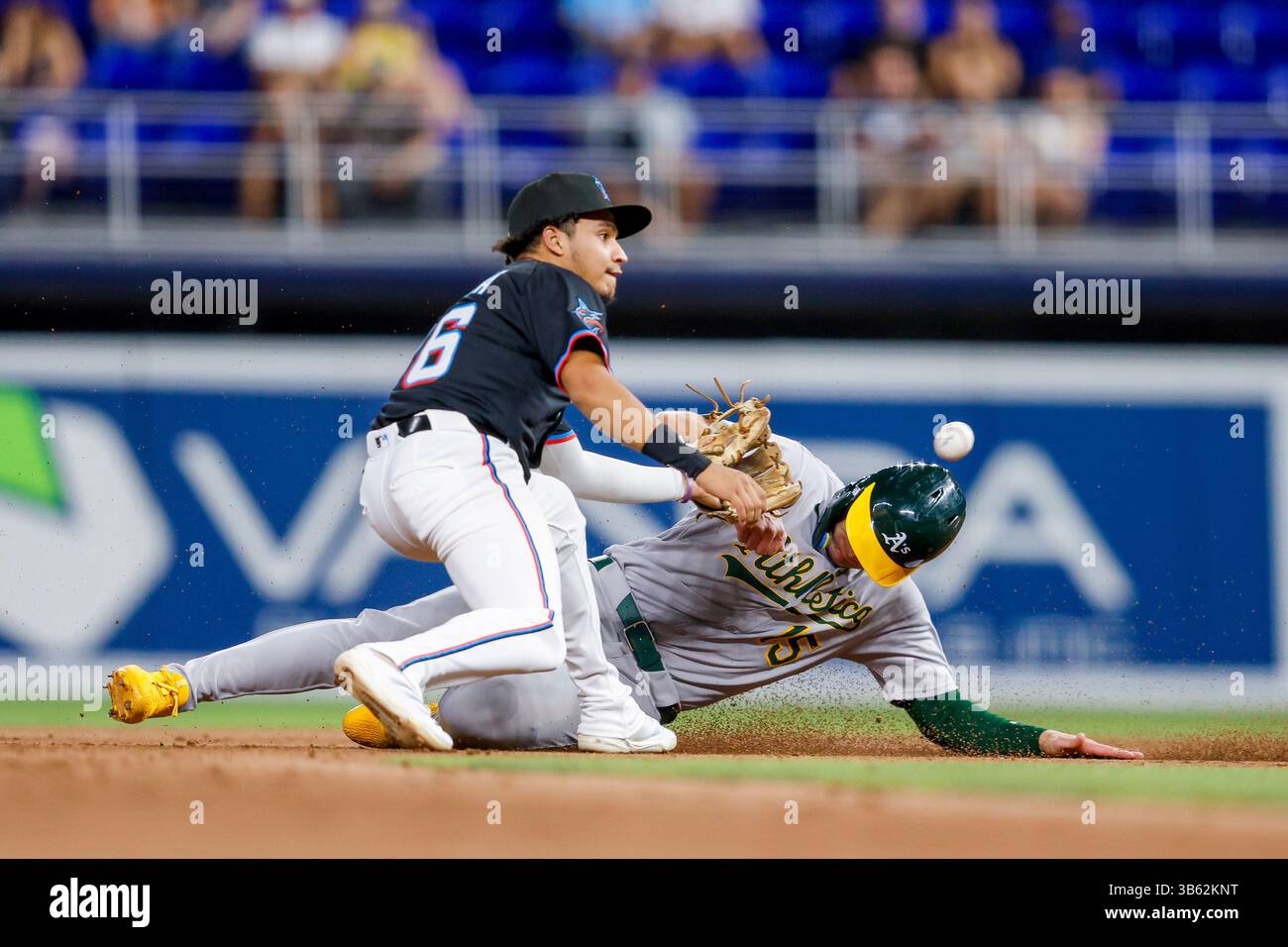 MIAMI, FL - MAY 02: Seth Brown #15 of the Oakland Athletics slides to ...